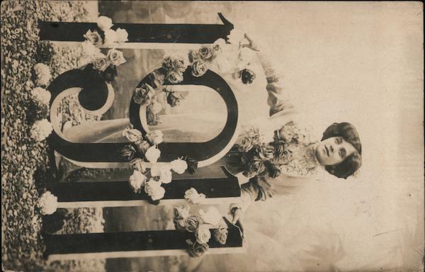Woman Standing Behind Large 1911 Women Postcard