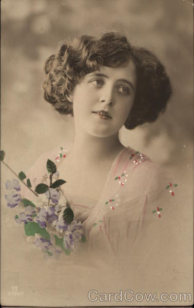 Girl Holding Purple Flowers Women girl-holding-purple-flowers-women