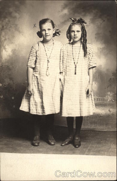 Two Girls in Matching Dresses