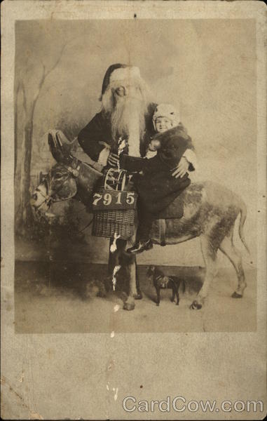 Santa and Child on Donkey Santa Claus Postcard