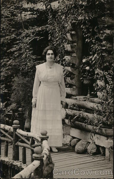 Mary Purnell Standing on a Bridge House of David Postcard
