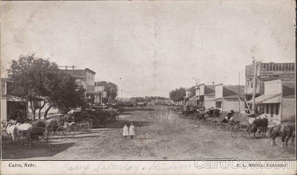 Main Street Packed with Horses and Buggies Cairo, NE Postcard