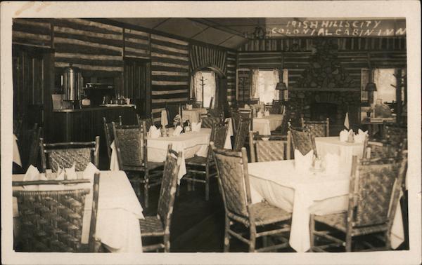 Irish Hills City, Colonial Cabin Inn, dining room Sand Lake, MI Postcard