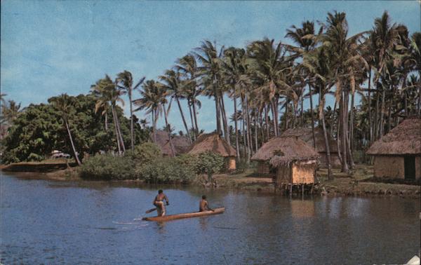 A River and Village Scene in Fiji, two men on canoe South Pacific Postcard